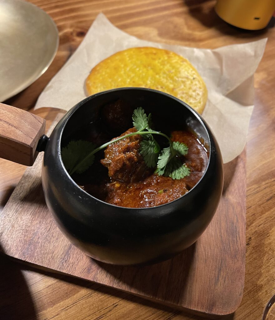 goat stew with sweet paratha at Pippal Indian regional cuisine ...